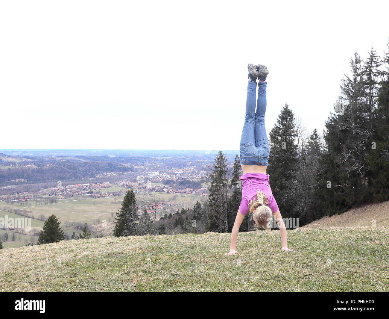Girl doing handstand hi-res stock photography and images - Alamy