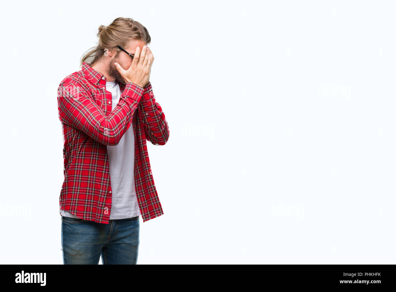 Young handsome man with long hair wearing glasses over isolated ...
