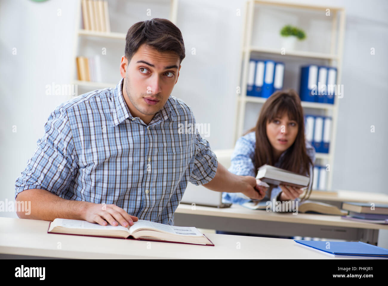 Students sitting and studying in classroom college Stock Photo - Alamy