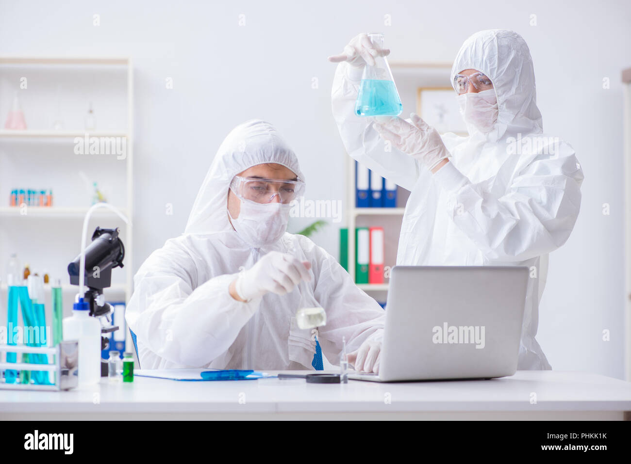 Two scientists working in the chemical lab Stock Photo - Alamy