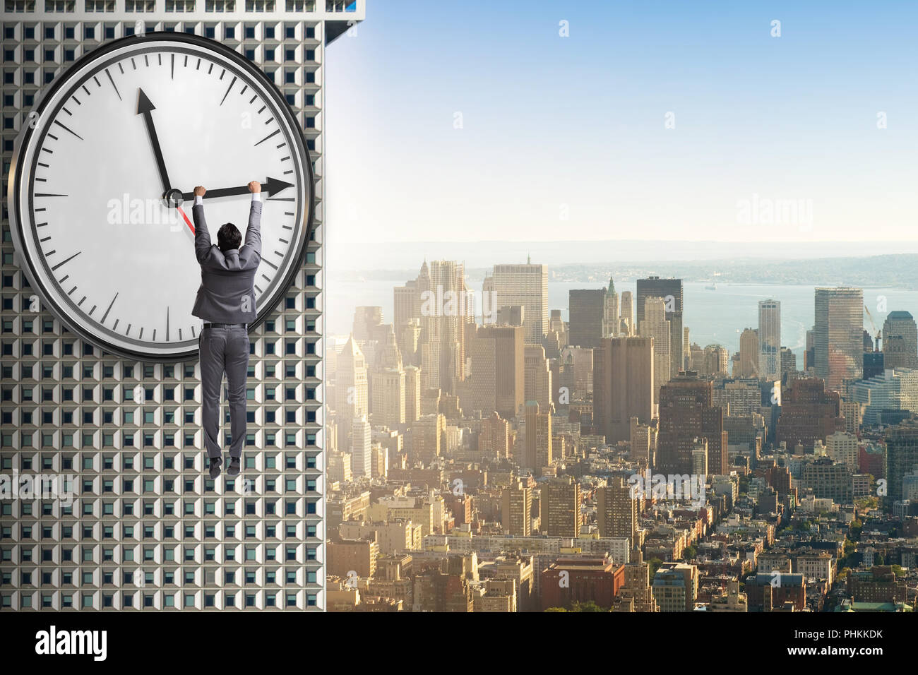 Businessman pulling clock in hi-res stock photography and images - Alamy