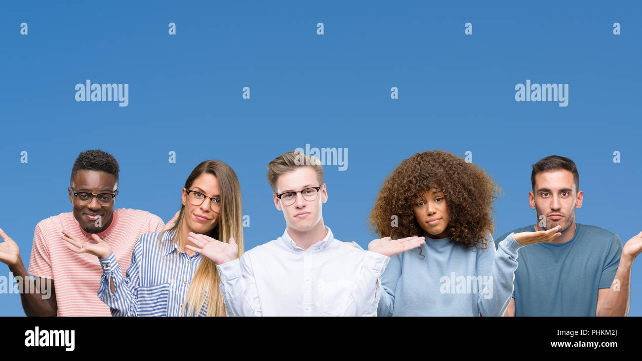 Composition of group of friends over blue blackground clueless and ...