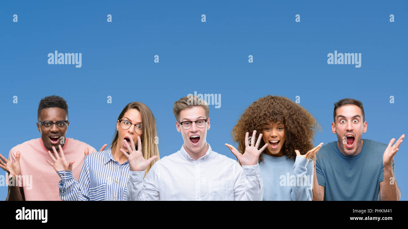 Composition of group of friends over blue blackground celebrating crazy ...