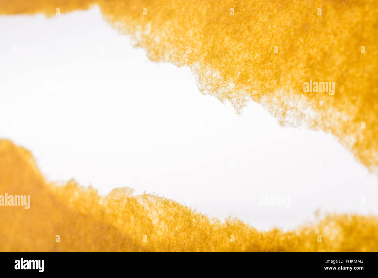 Torn Yellow Paper on a white background Stock Photo - Alamy