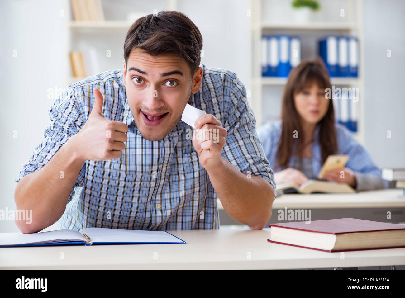 Students sitting and studying in classroom college Stock Photo - Alamy