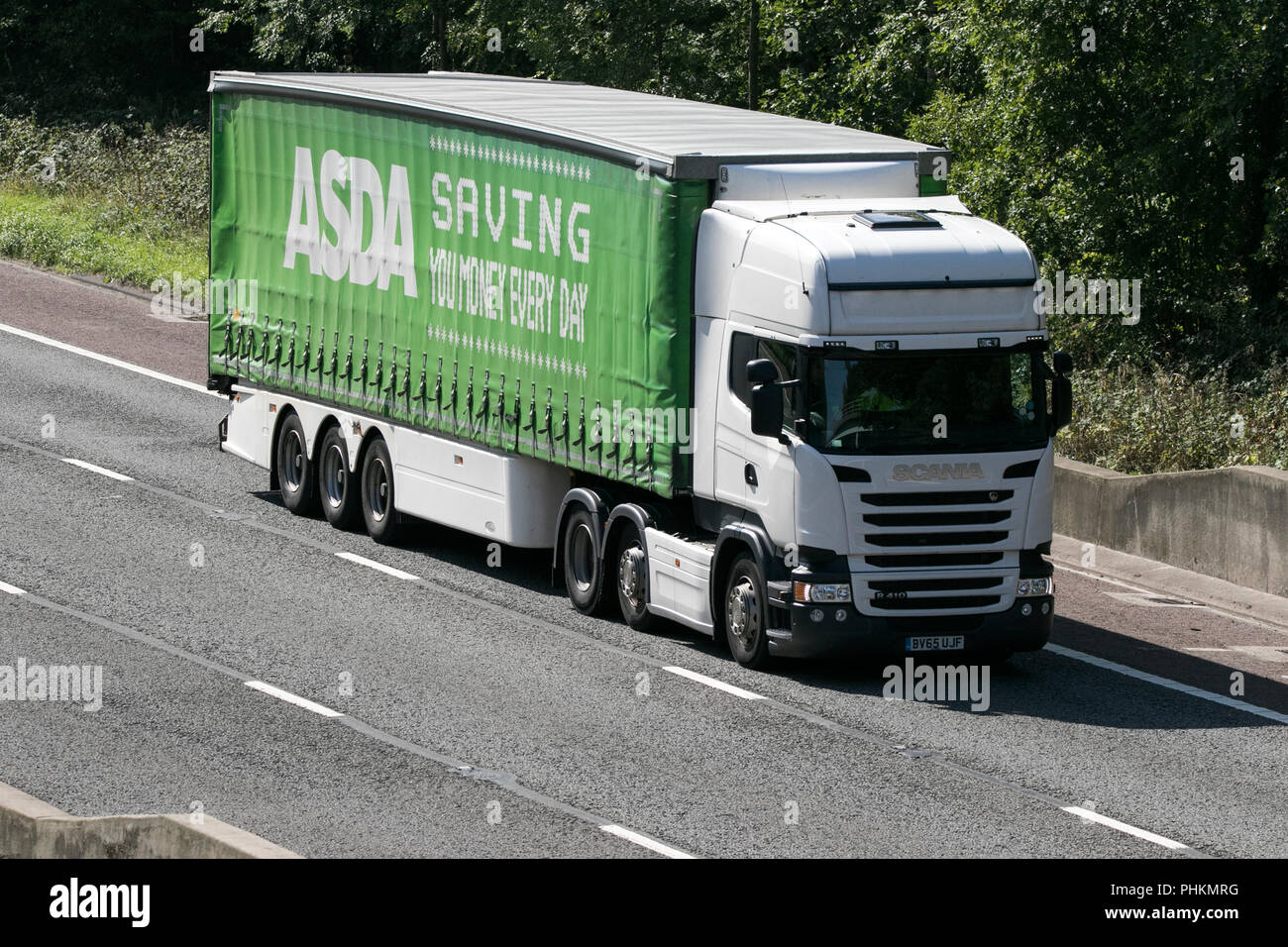 Heavy goods lorries logistics transport vehicles on the M6 at Lancaster ...
