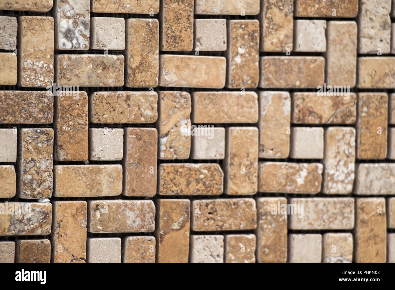 Decorative stone background built of little stones Stock Photo - Alamy