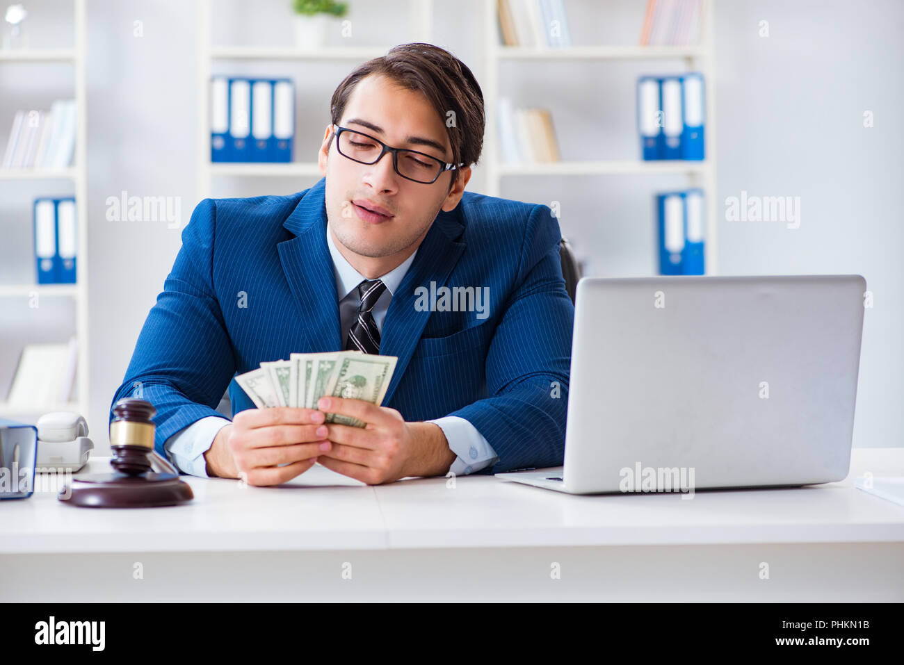 Lawyer receiving money as bribe hi-res stock photography and images - Alamy