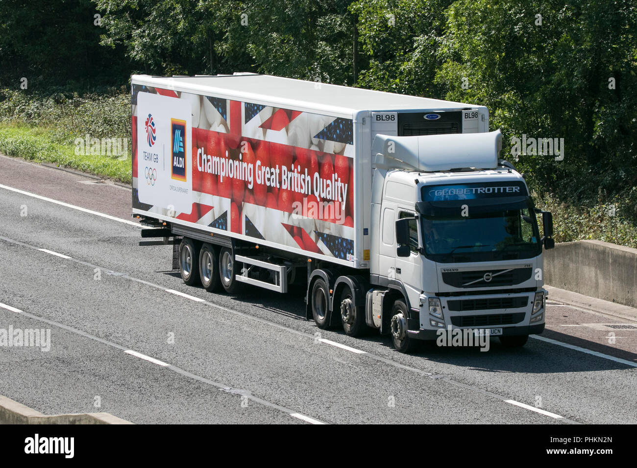 Heavy goods lorries logistics transport vehicles on the M6 at Lancaster ...