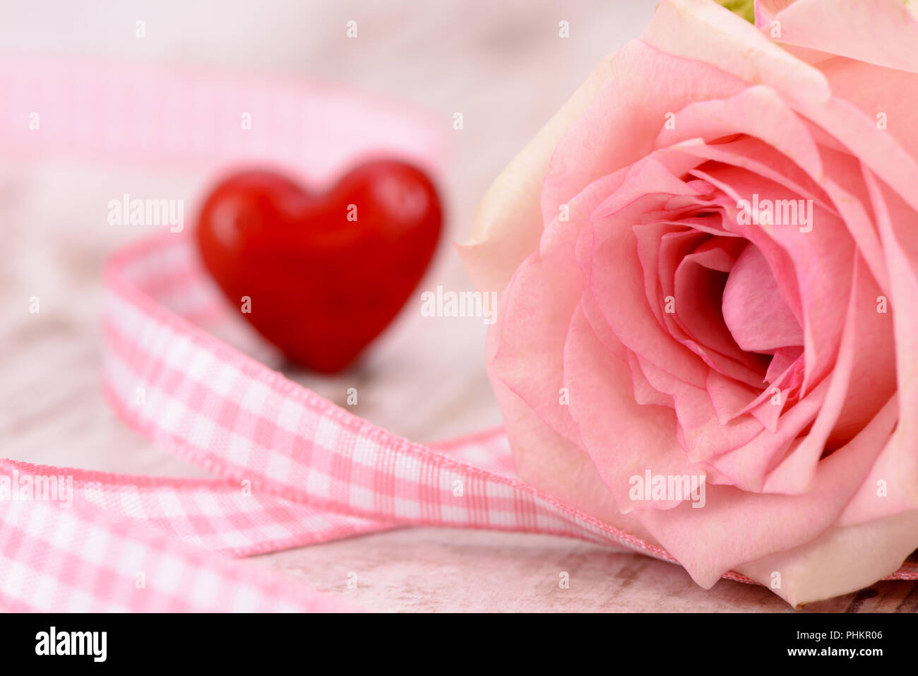rose flower with heart as symbol for love Stock Photo - Alamy