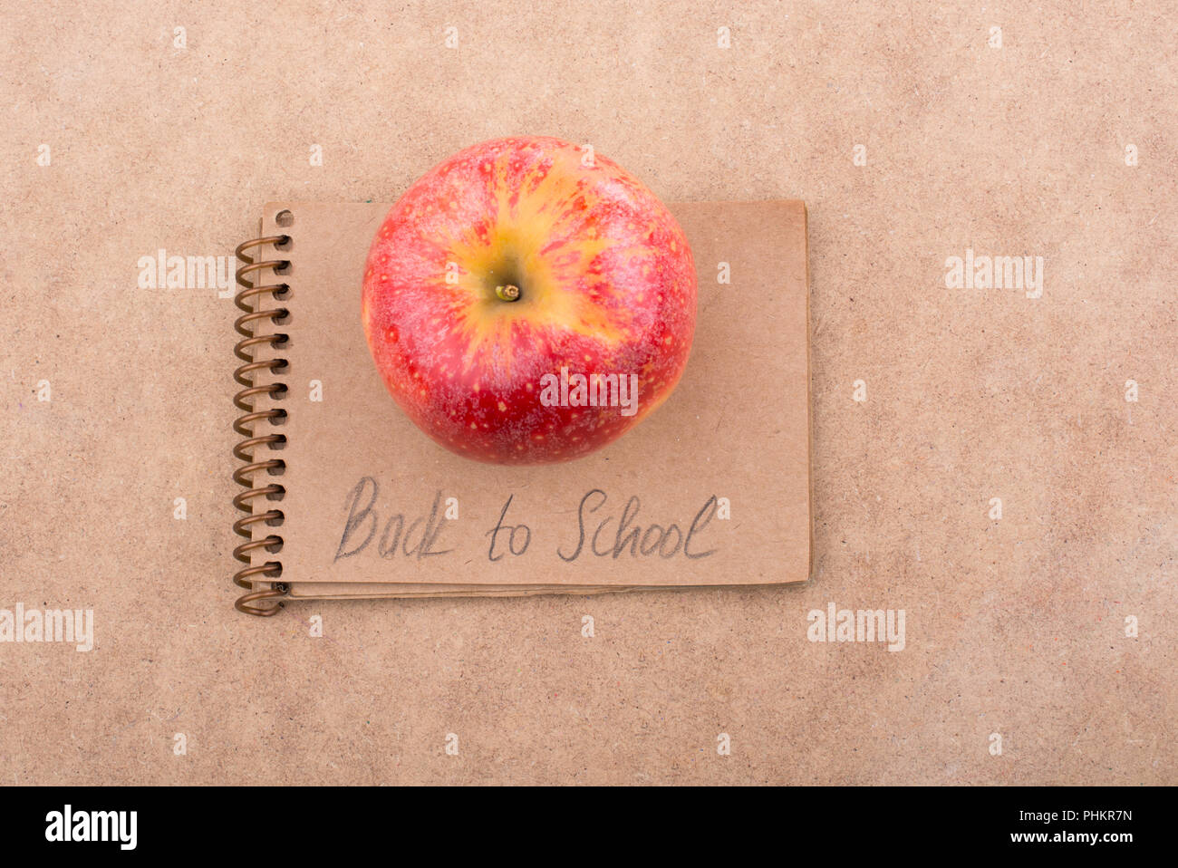 Back to school lettering with with a notebook on ground Stock Photo - Alamy