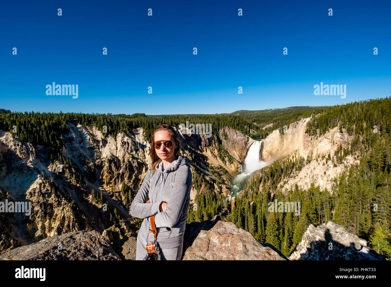 Yellowstone waterfall and hiker hi-res stock photography and images - Alamy
