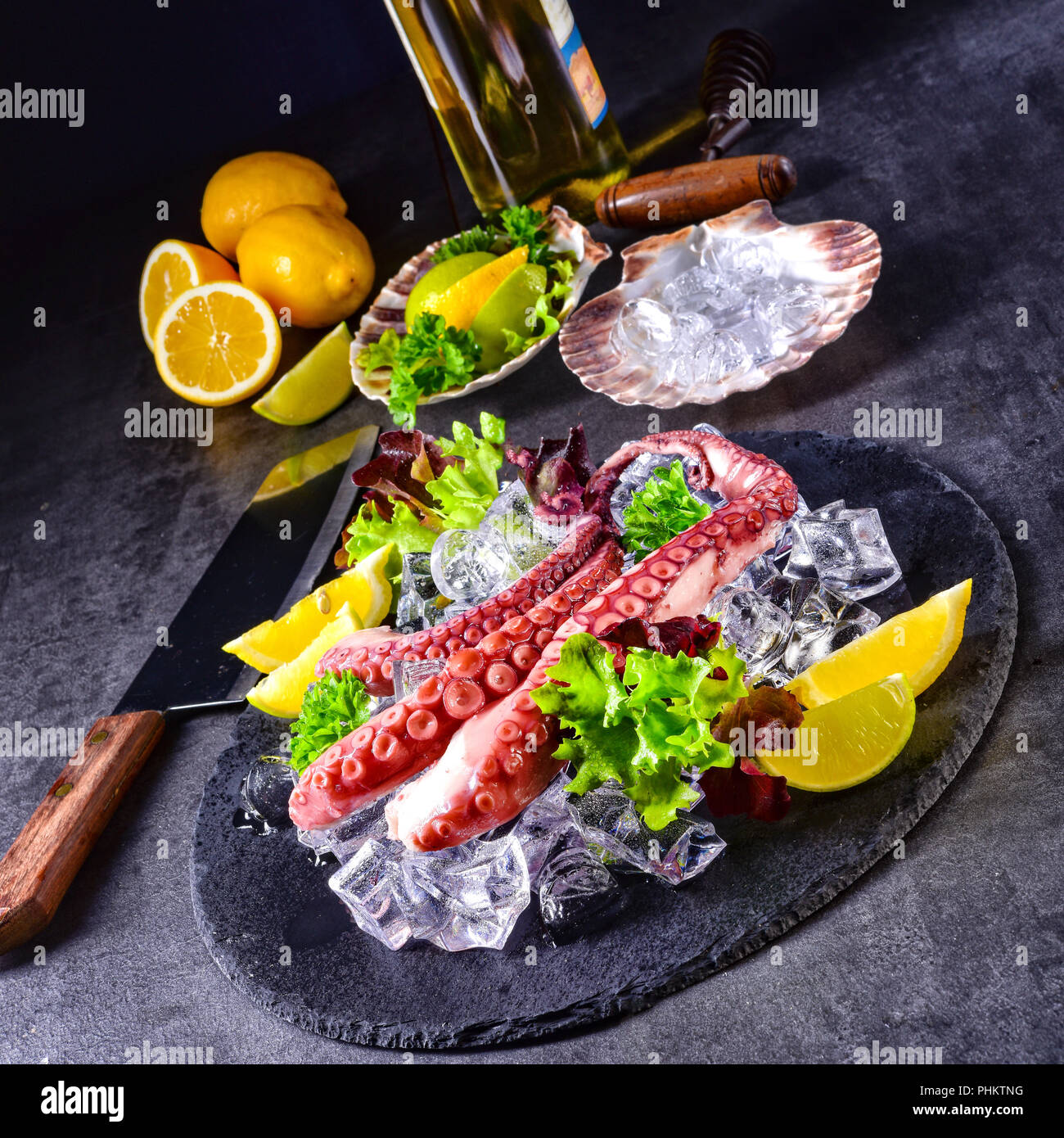 raw octopus on the ice Stock Photo - Alamy