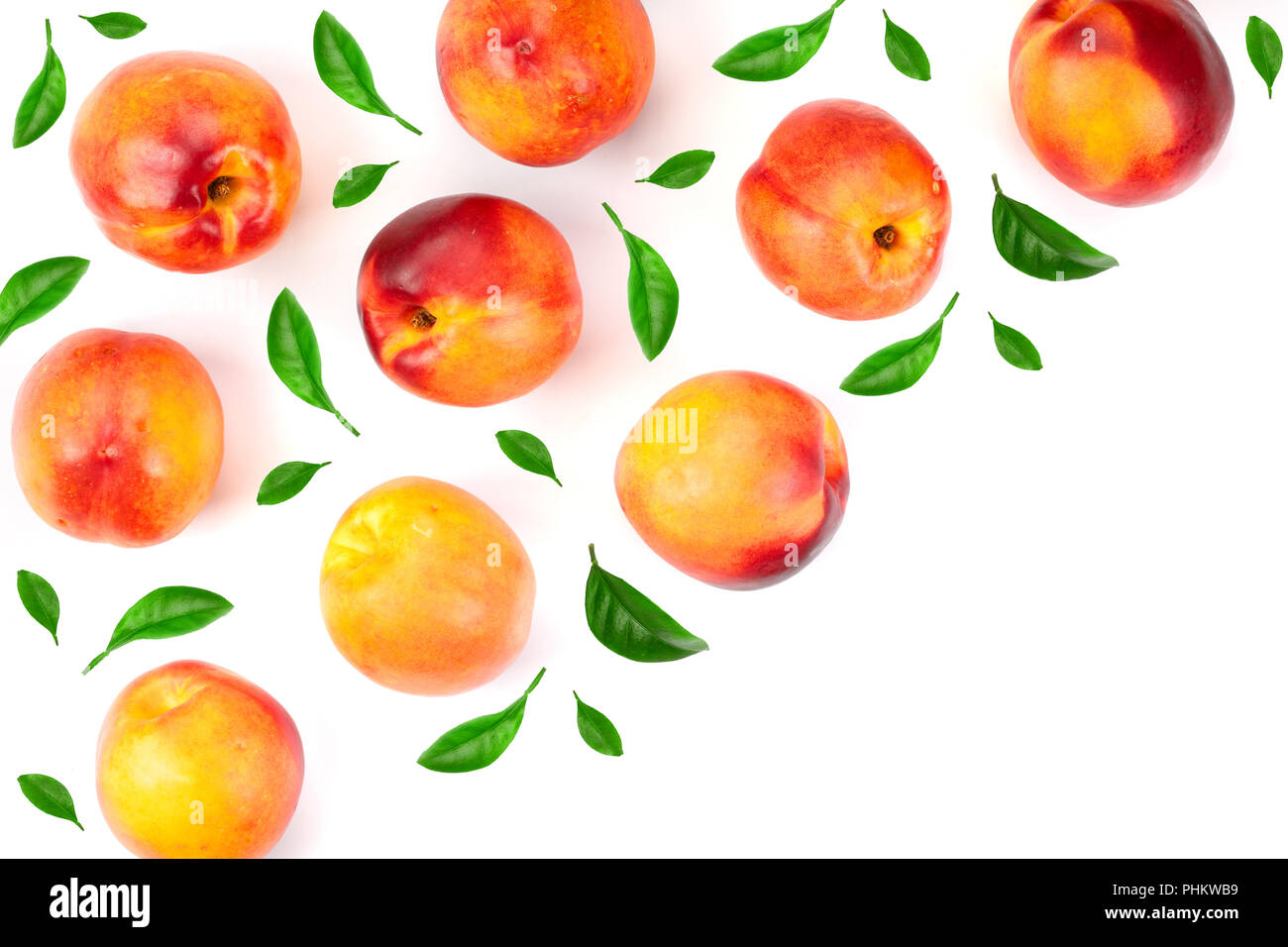 ripe nectarine with leaves isolated on white background with copy space ...