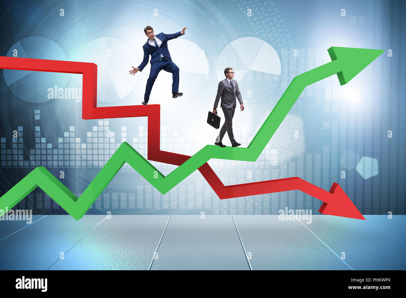 Businessman with charts of growth and decline hi-res stock photography ...
