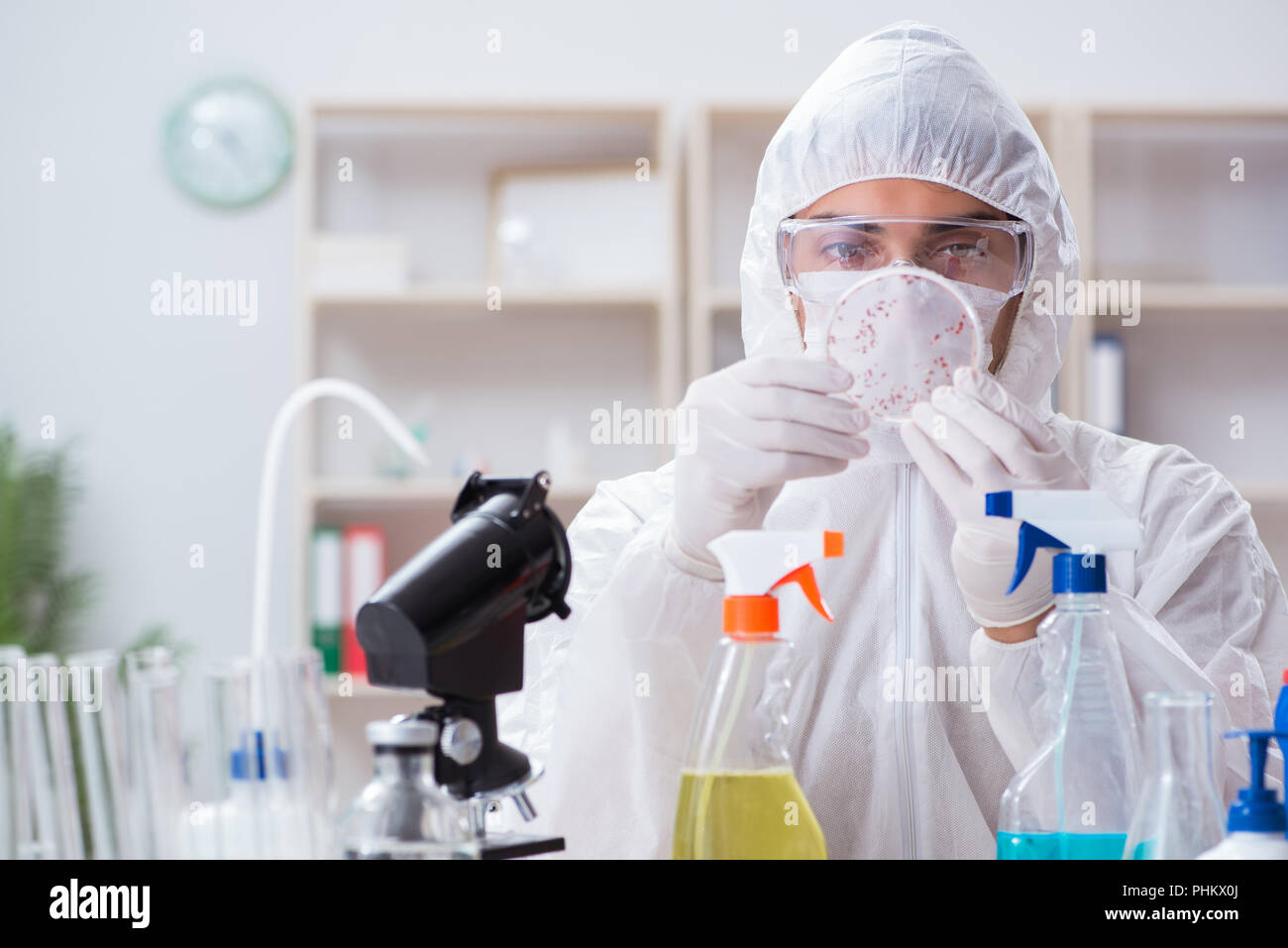 Woman research chemist testing virus hi-res stock photography and ...