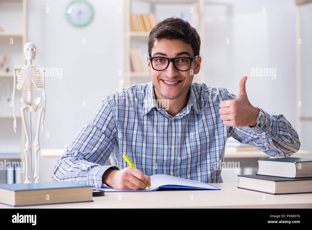 Medical student studying in classroom Stock Photo - Alamy
