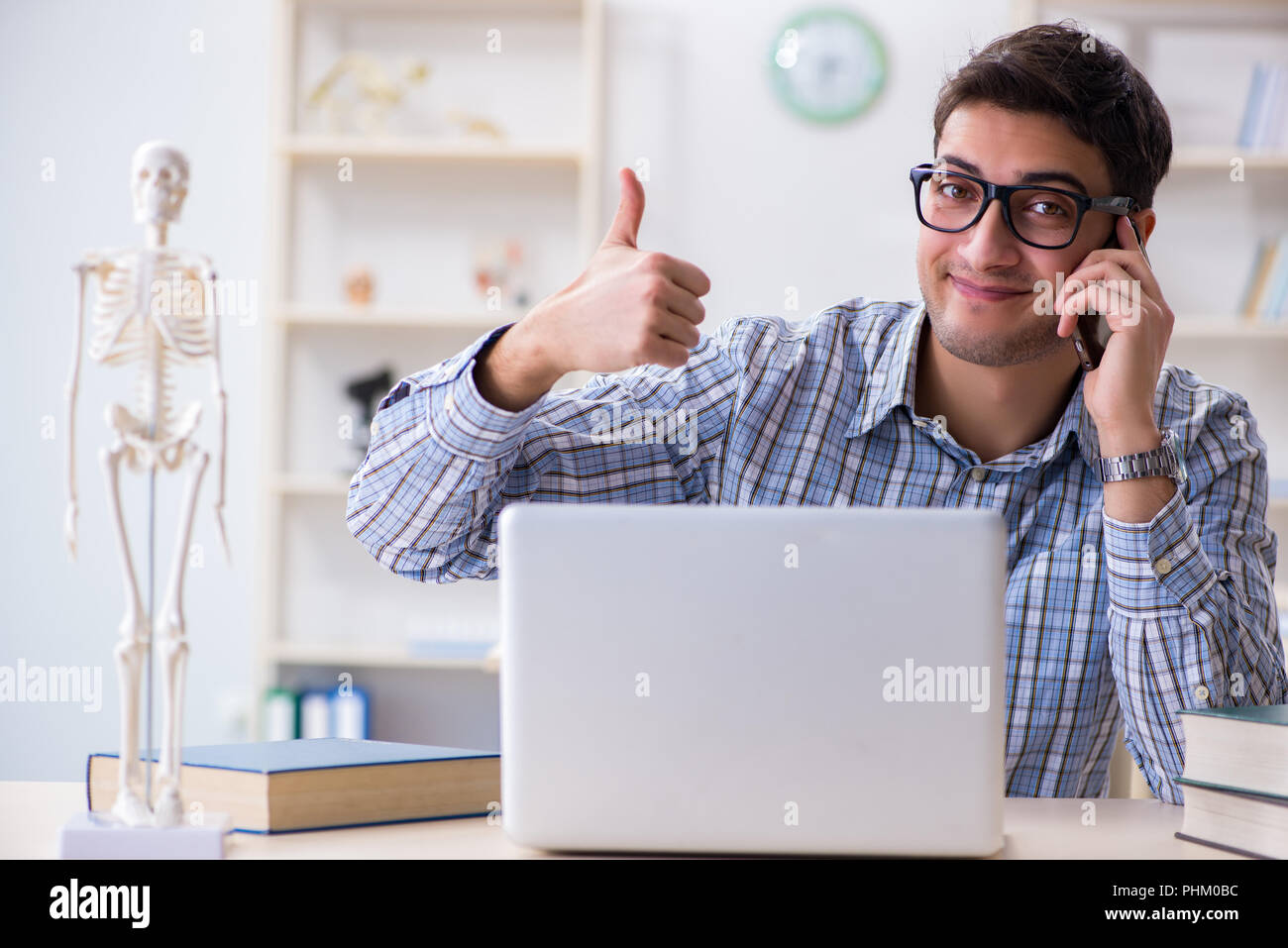 Medical student studying in classroom Stock Photo - Alamy