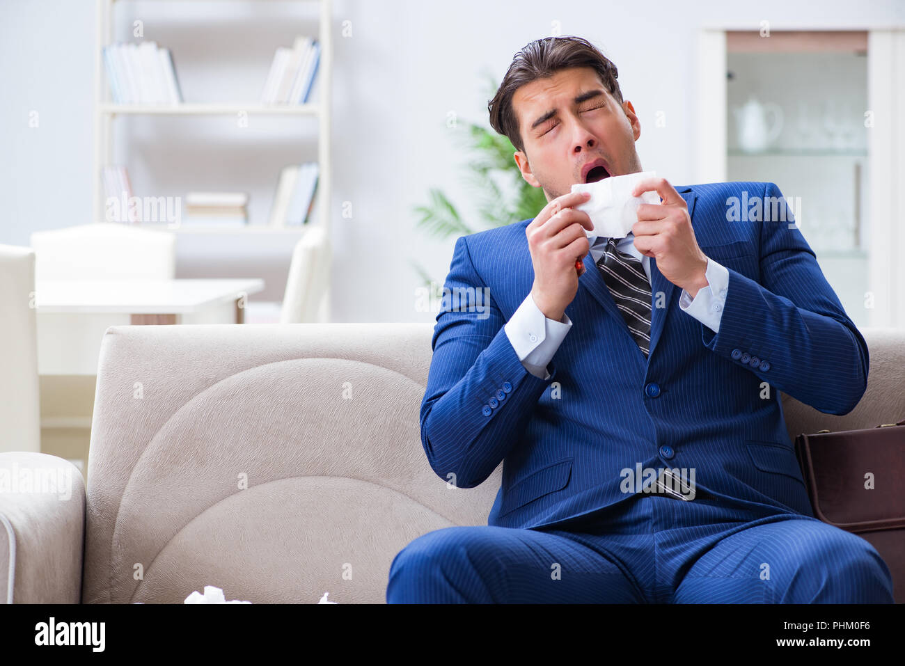 Sick employee staying at home suffering from flue Stock Photo - Alamy