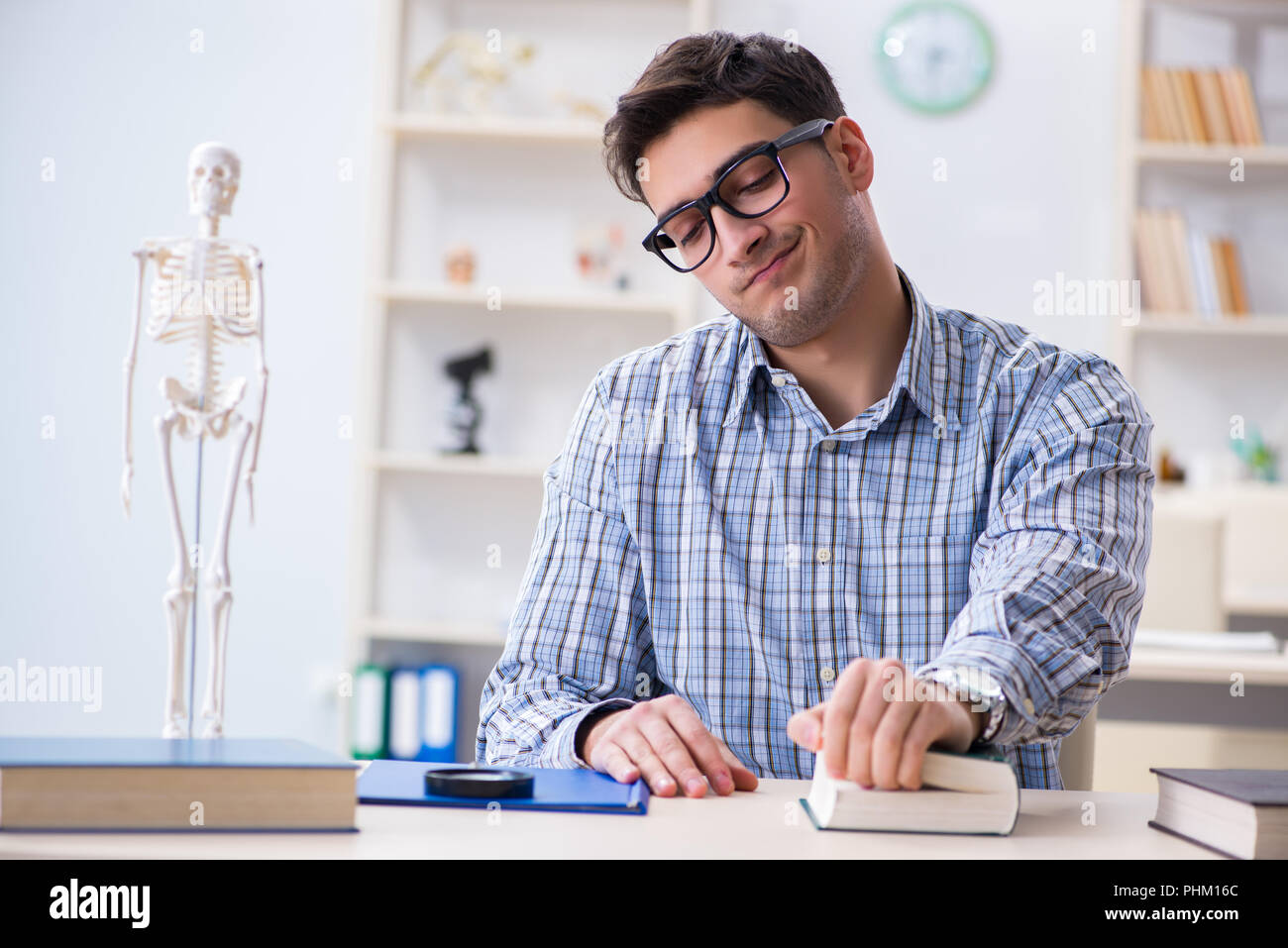 Medical student studying in classroom Stock Photo - Alamy