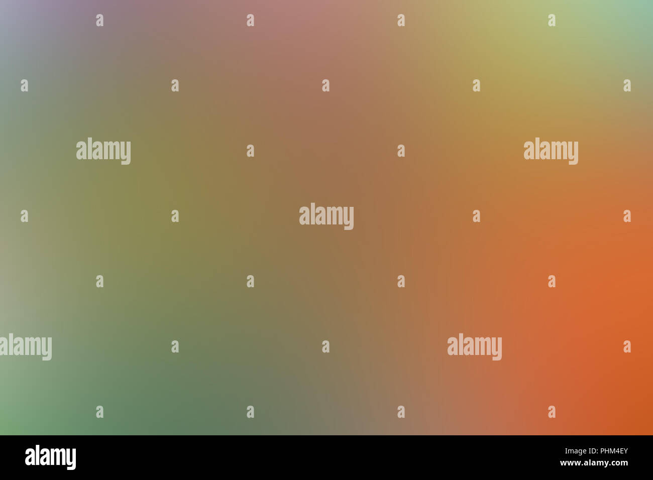 Abstract pastel soft colorful smooth blurred textured background off focus toned in orange and ...