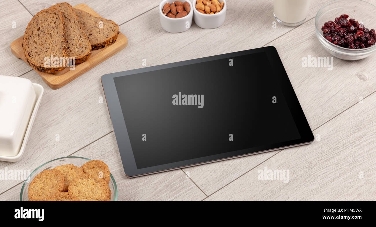 Healthy food composition with empty tablet Stock Photo - Alamy