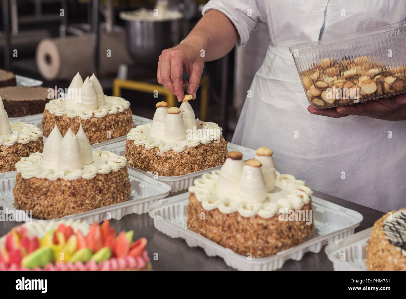 Manual cakes production hi-res stock photography and images - Alamy