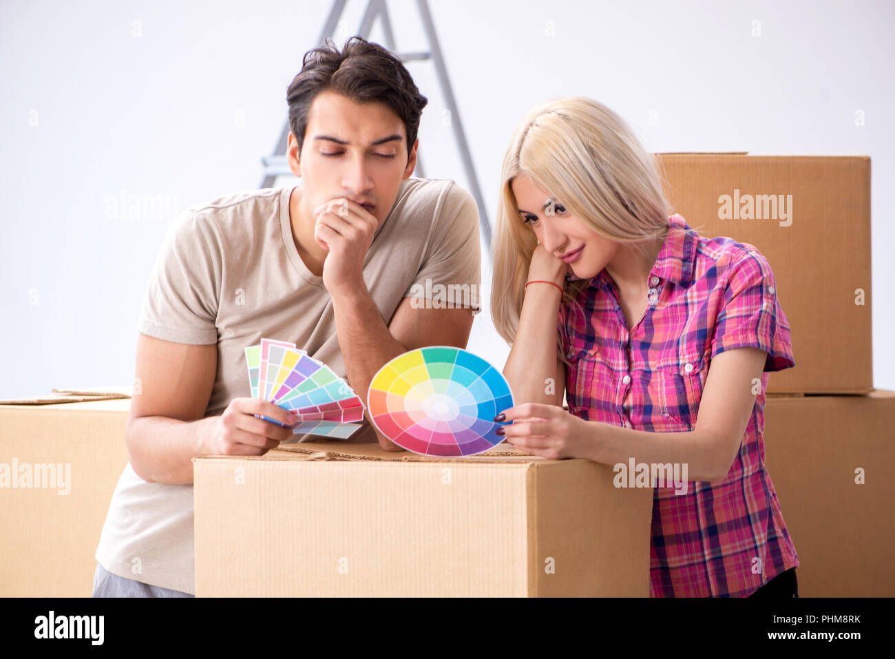 Young family preparing for home renovation Stock Photo - Alamy