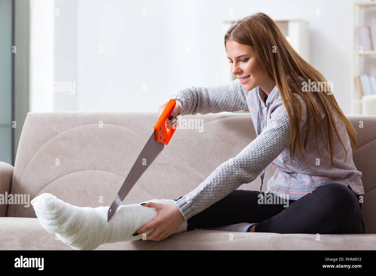 Young woman with broken leg at home Stock Photo - Alamy