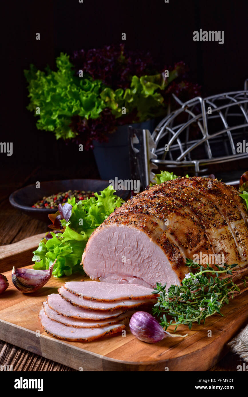 cooked ham with colorful pfefer Stock Photo - Alamy