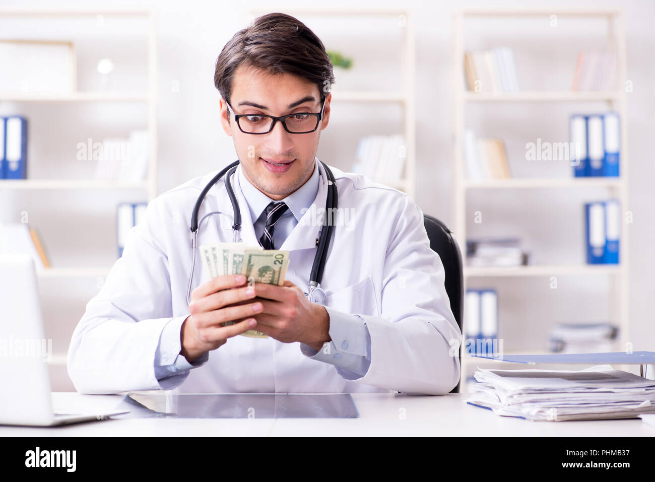 Doctor money envelope hi-res stock photography and images - Alamy