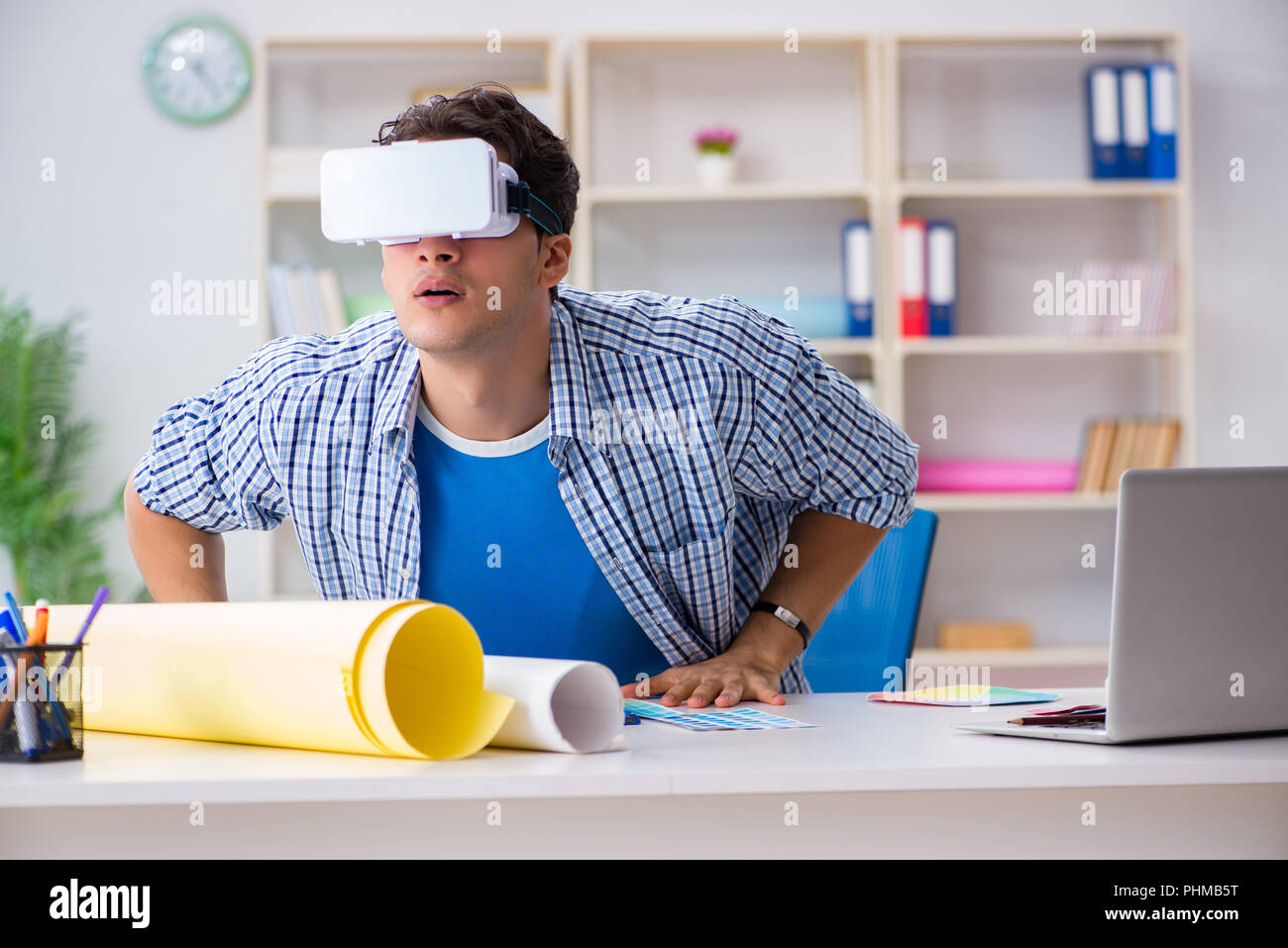 Young designer with virtual reality VR glasses Stock Photo - Alamy