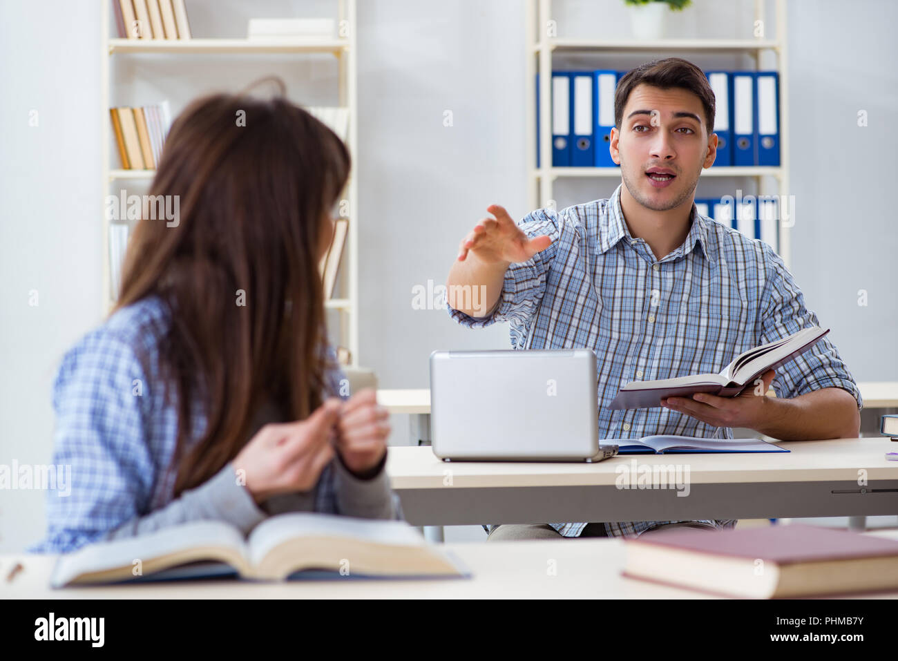 Students sitting and studying in classroom college Stock Photo - Alamy