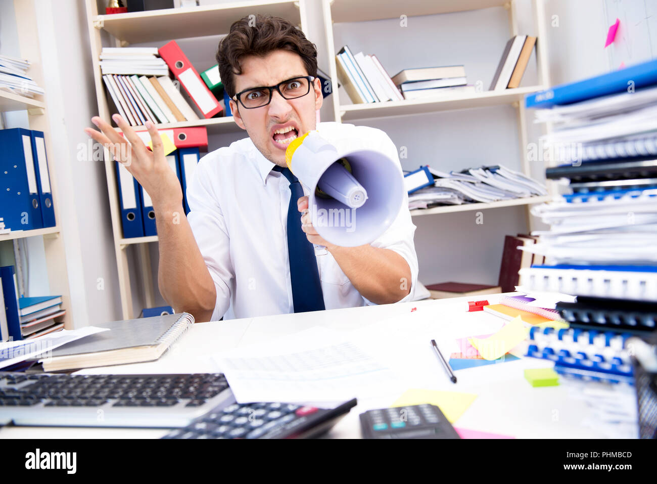 Busy frustrated businessman angry in the office Stock Photo - Alamy