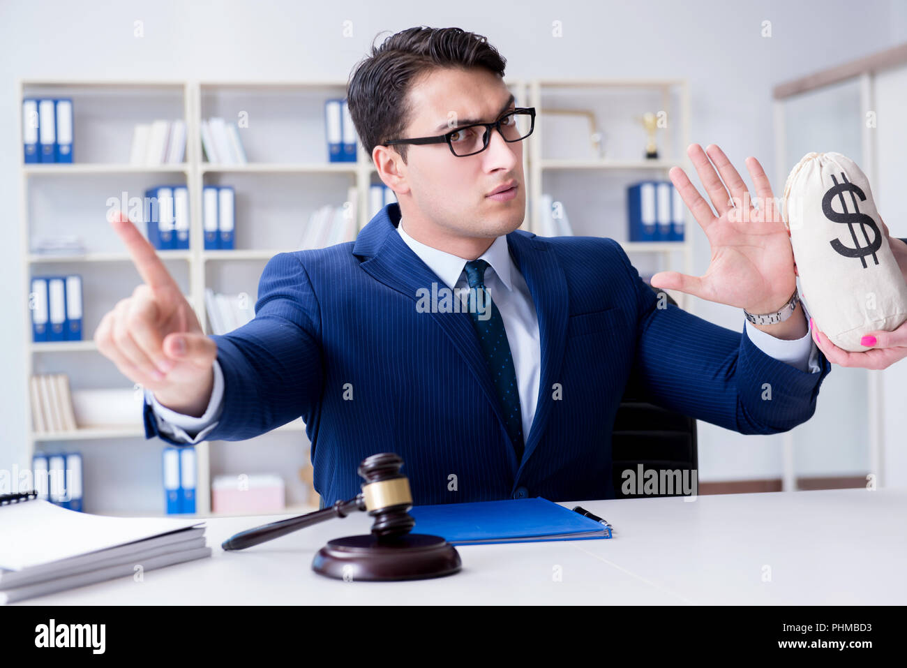 Judge in bribe concept with money Stock Photo - Alamy