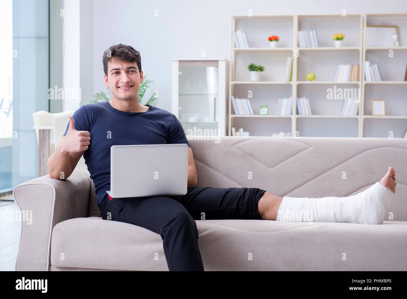 Happy man broken leg hi-res stock photography and images - Alamy