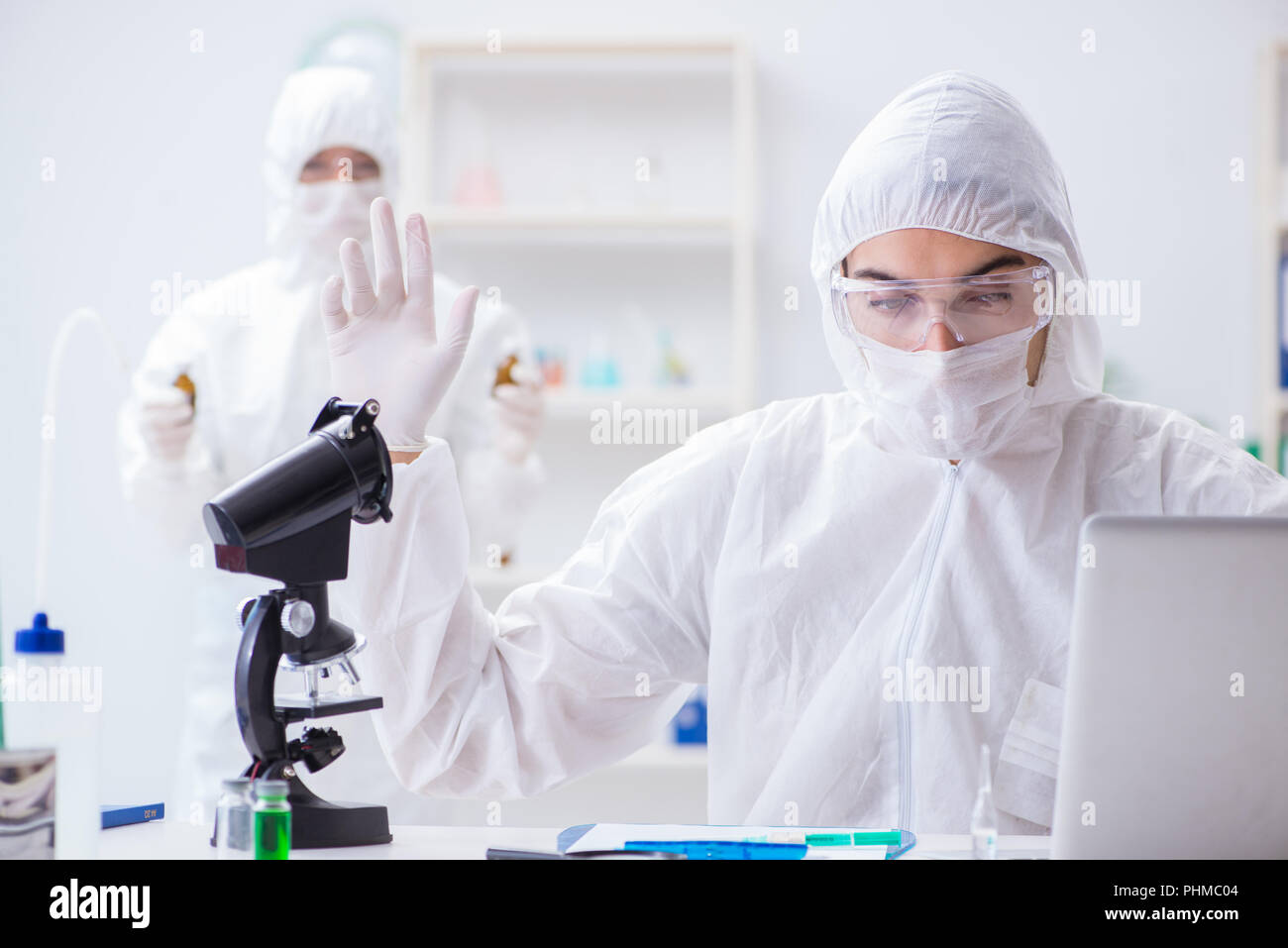 Two scientists working in the chemical lab Stock Photo - Alamy