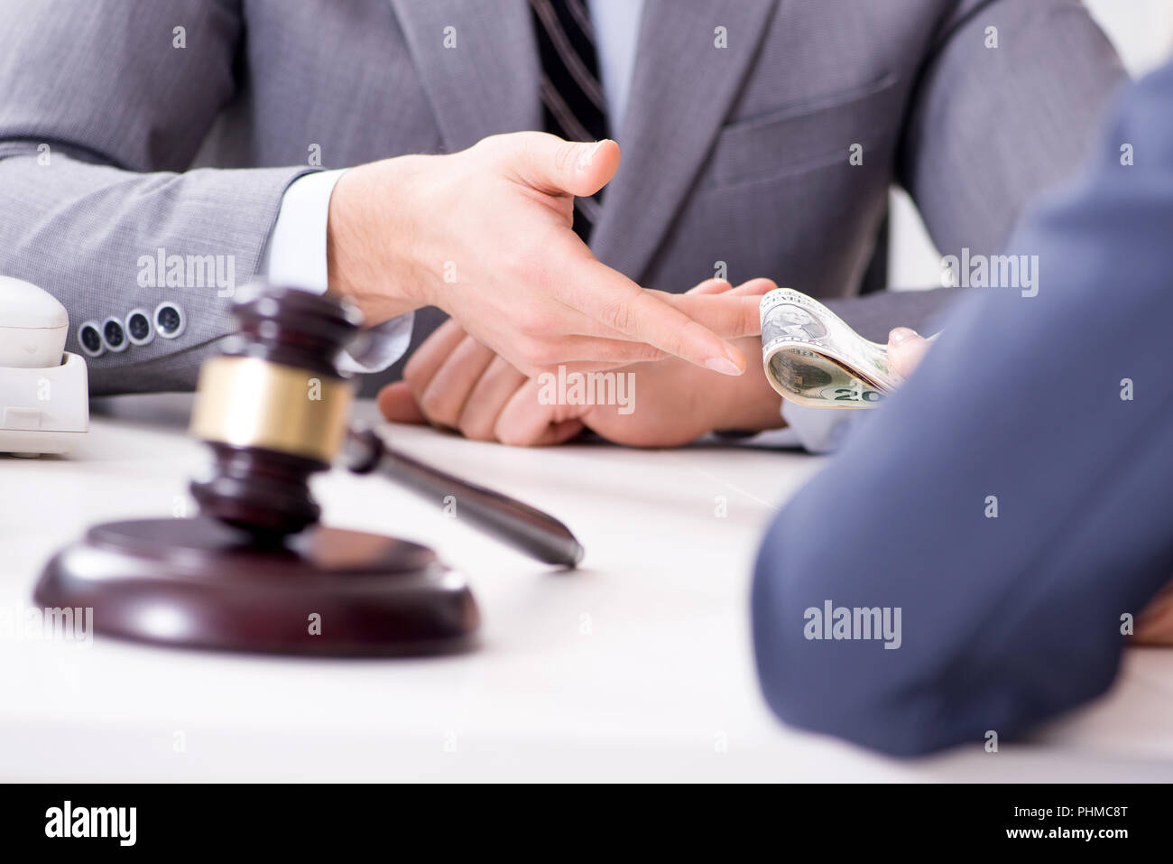 Lawyer being offered bribe for his services Stock Photo - Alamy