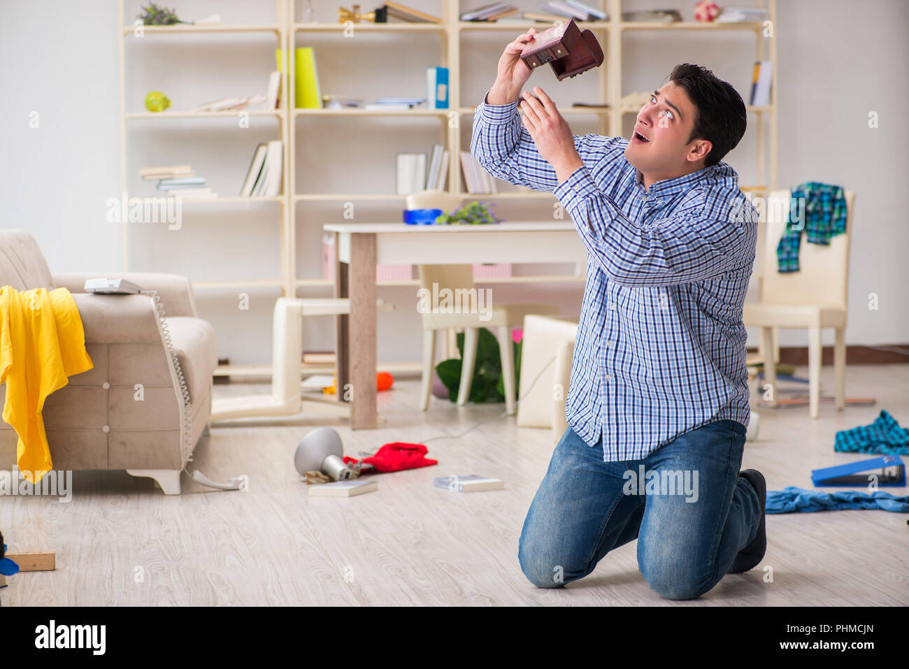 Man found his house after burglary robbed by burglars Stock Photo - Alamy