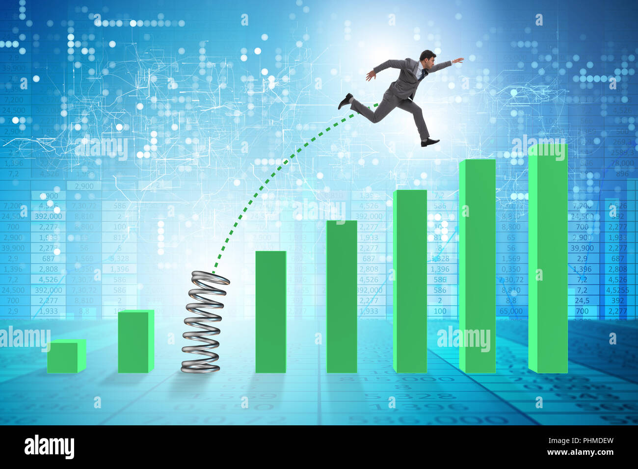 Business people jumping over bar charts Stock Photo - Alamy