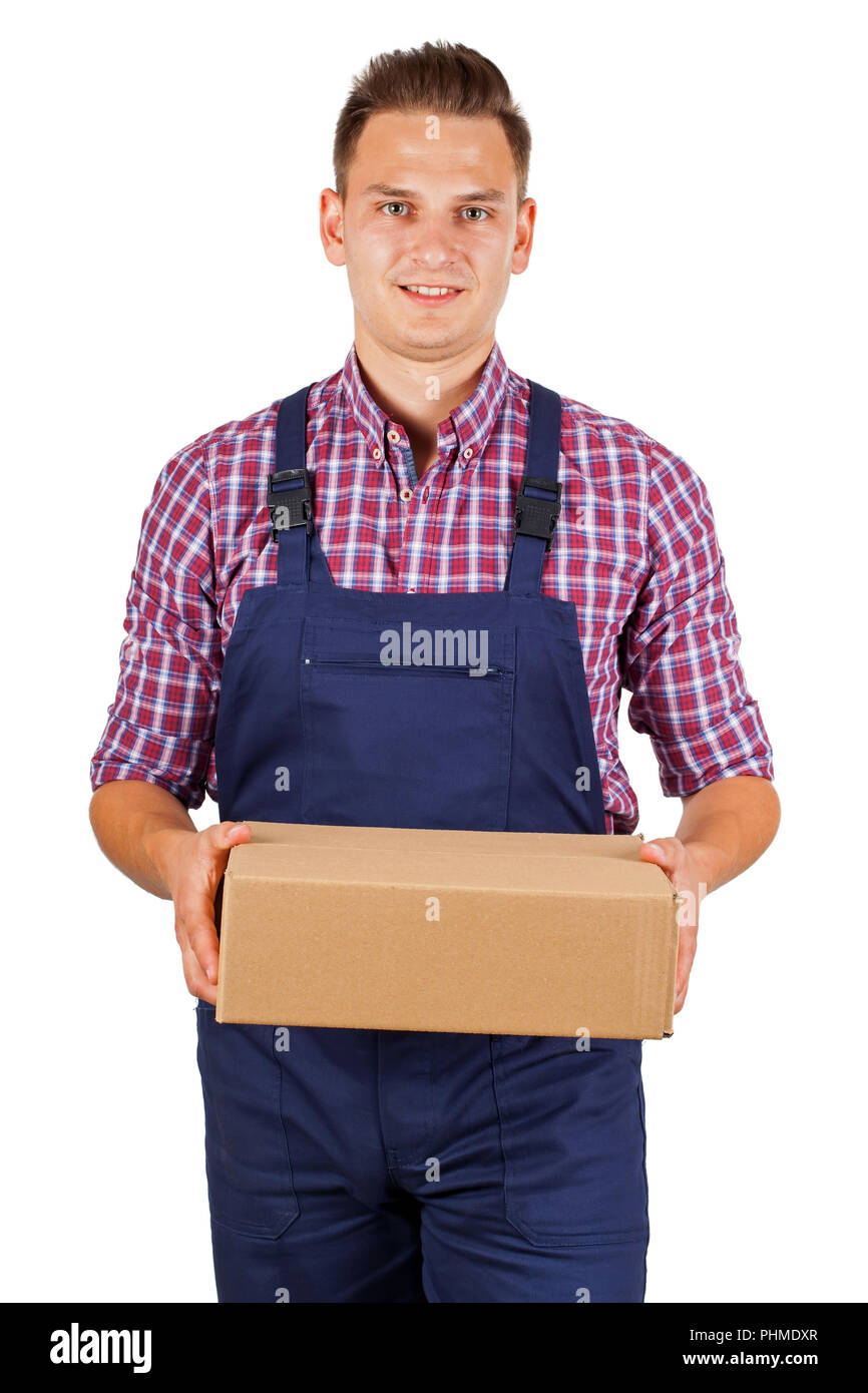 Handsome worker in uniform delivering package in a carton box - on ...