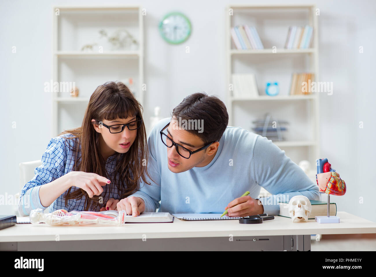 Two medical students studying in classroom Stock Photo - Alamy