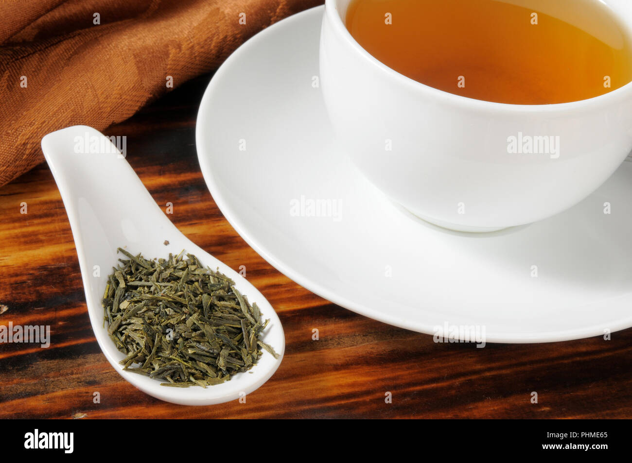 Loose leaf organic green tea in a sample spoon Stock Photo - Alamy