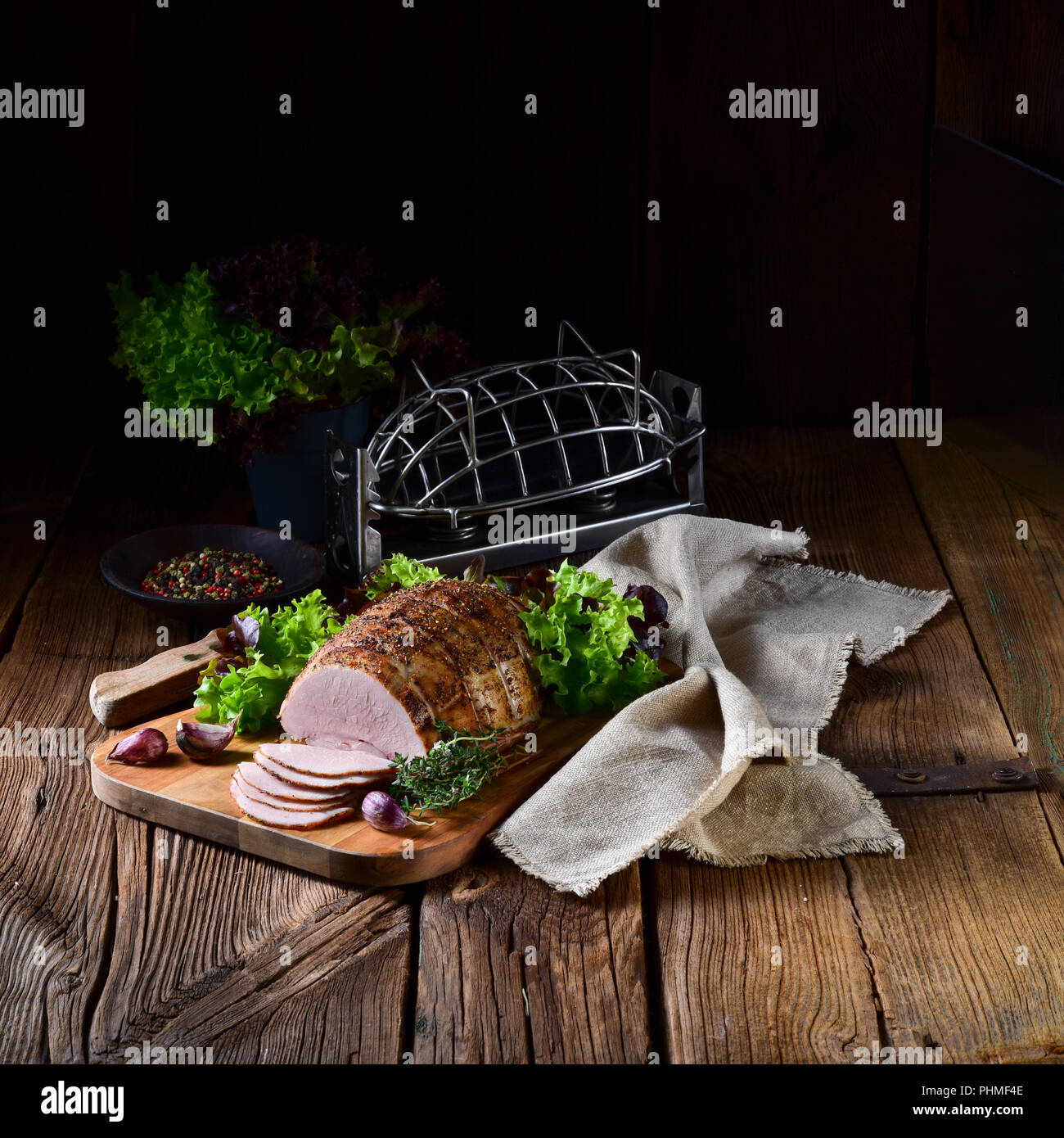 cooked ham with colorful pfefer Stock Photo - Alamy