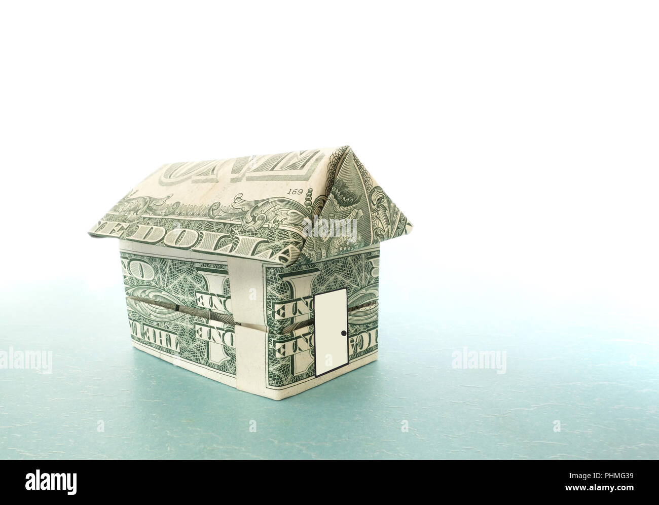 dollar house on white Stock Photo - Alamy