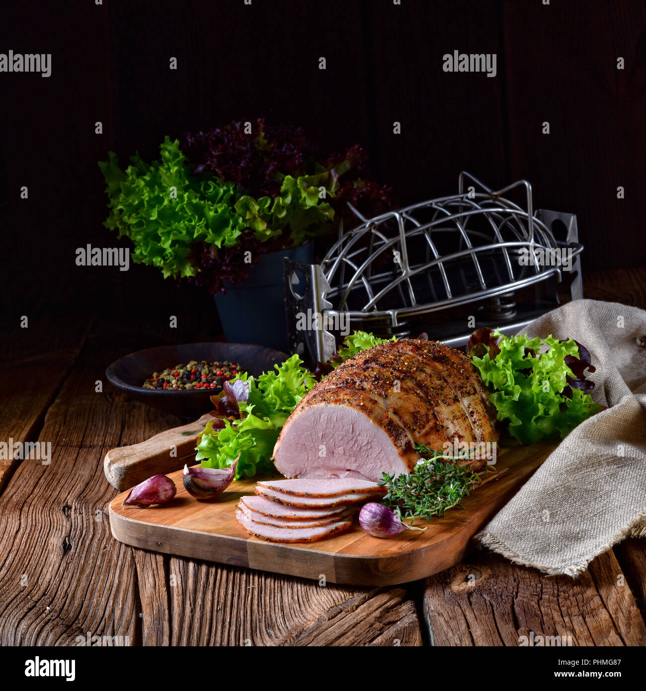 cooked ham with colorful pfefer Stock Photo - Alamy