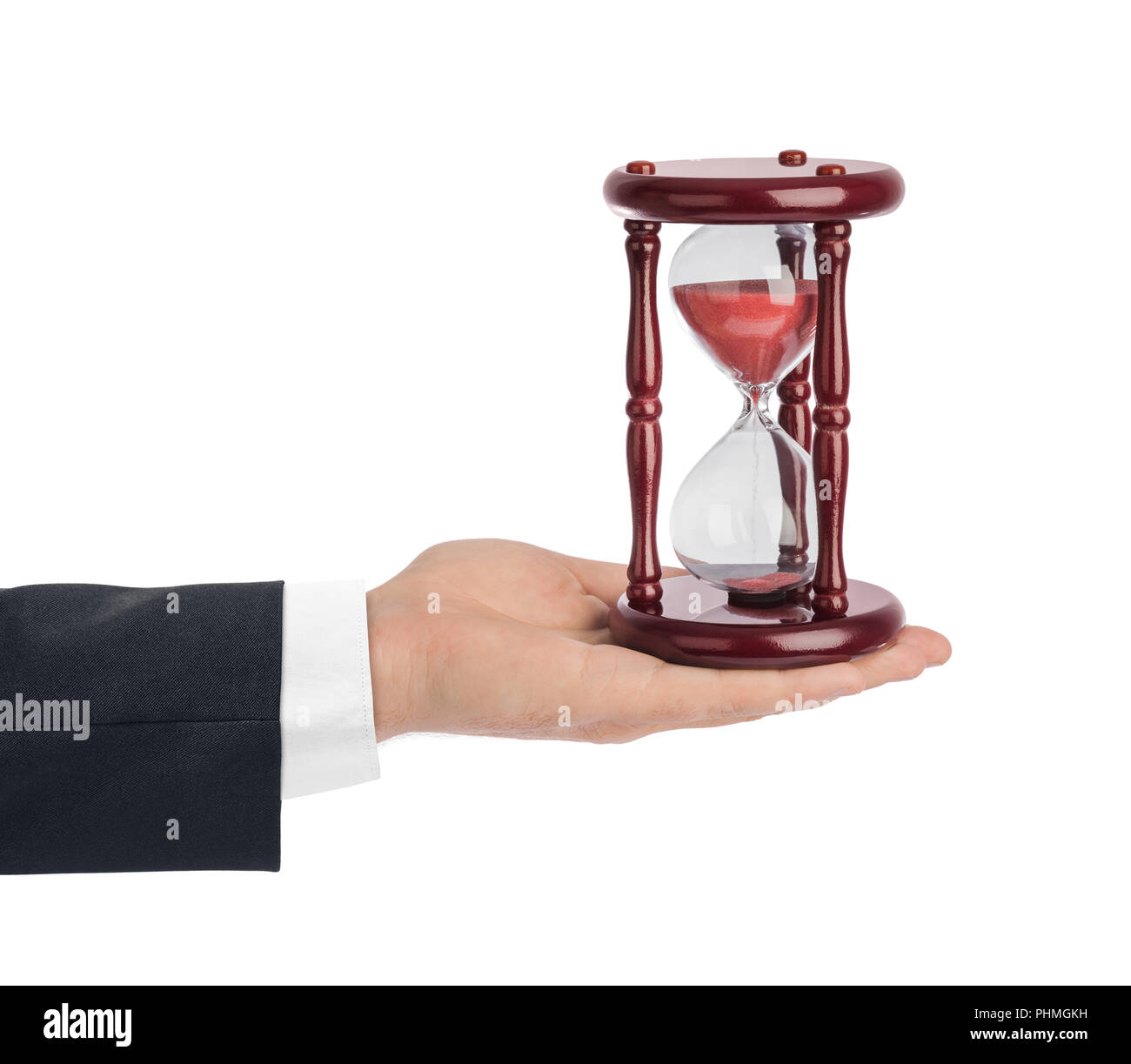 Hand with hourglass Stock Photo - Alamy