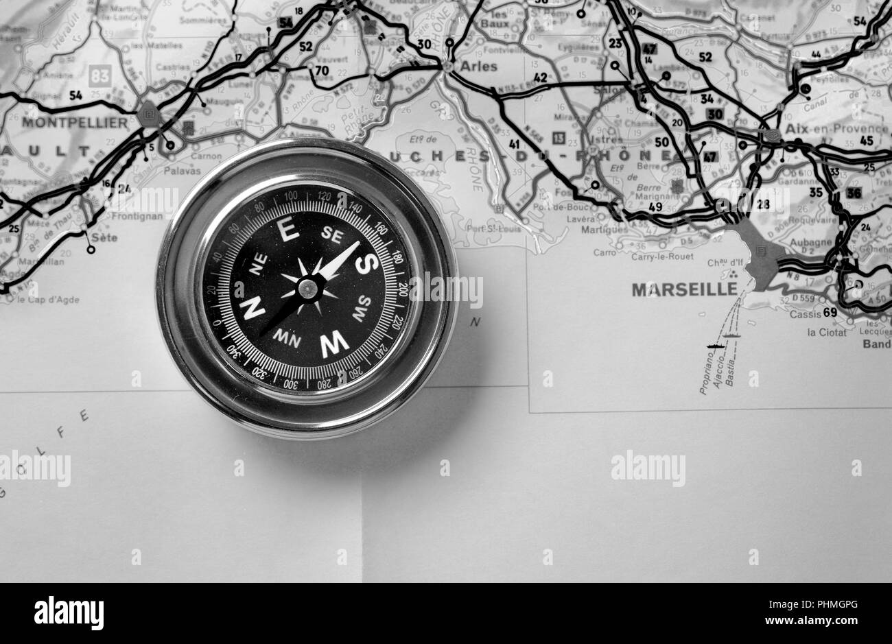 compass isolated on the geographical map - closeup Stock Photo - Alamy