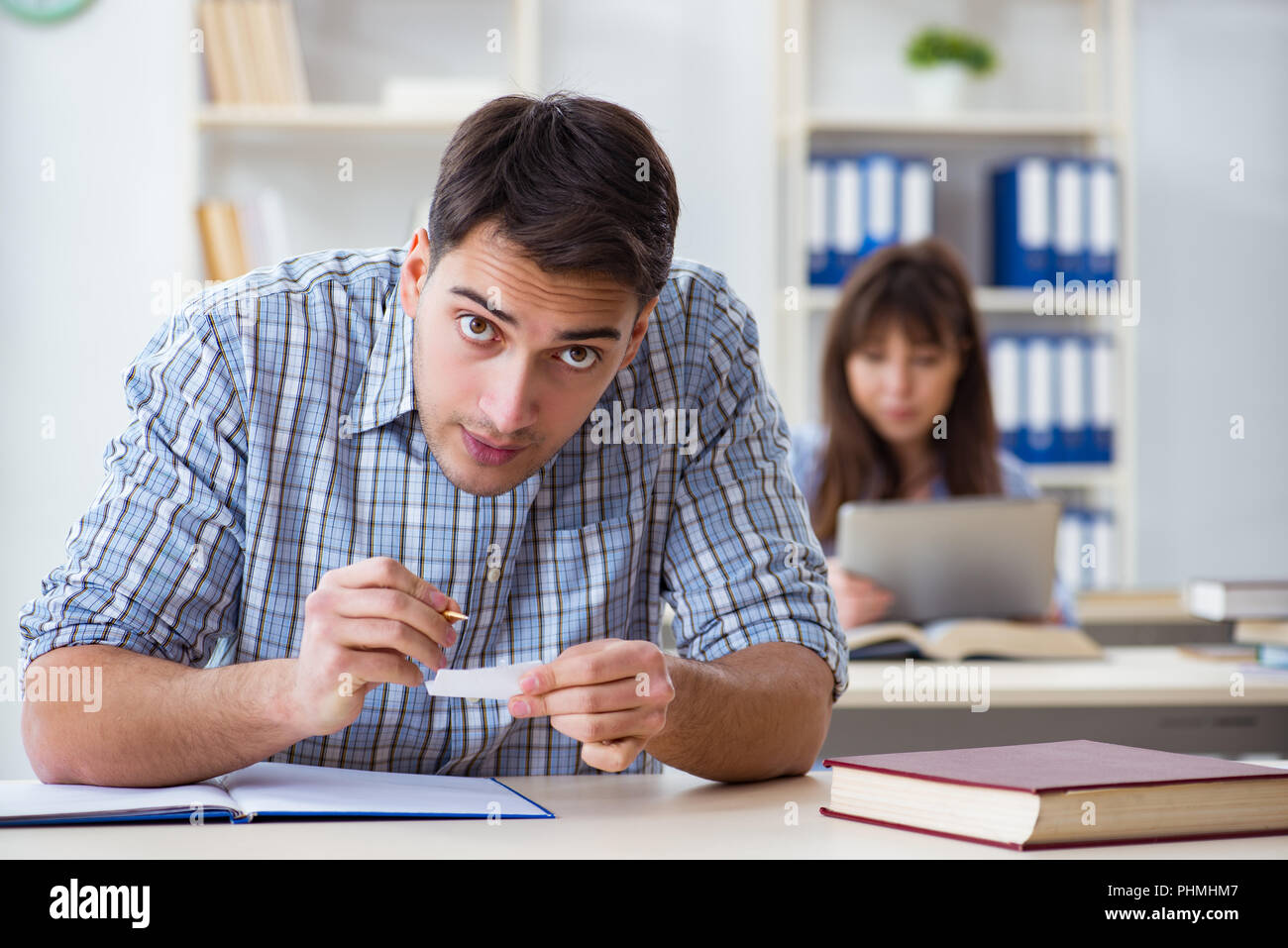 Students sitting and studying in classroom college Stock Photo - Alamy