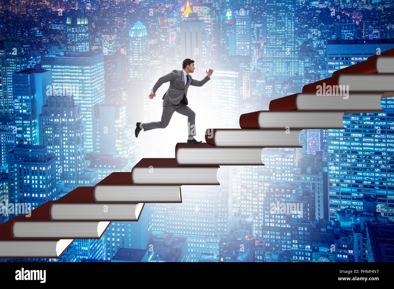 Man climbing up ladder knowledge hi-res stock photography and images ...